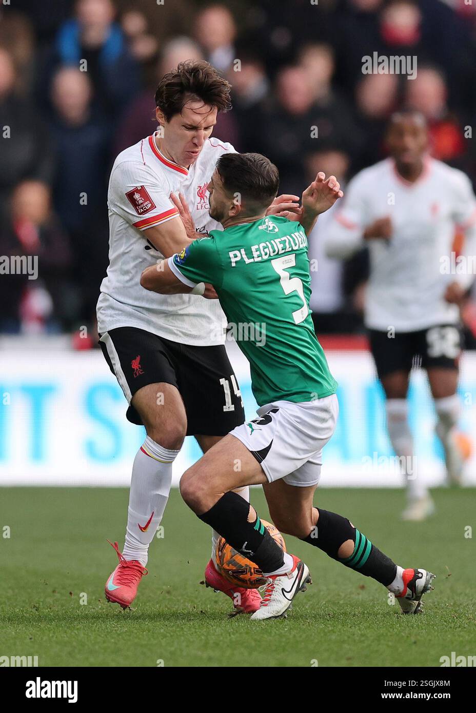 Plymouth, UK. 9th Feb, 2025. Julio Pleguezuelo of Plymouth Argyle with Federico Chiesa of ...