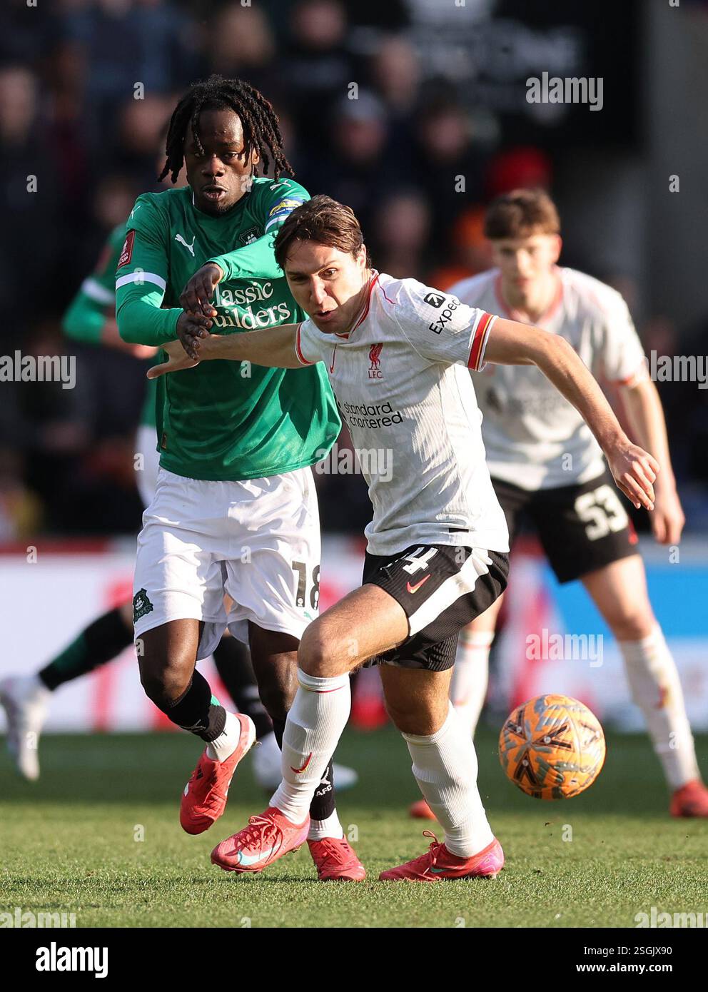 Plymouth, UK. 9th Feb, 2025. Darko Gyani of Plymouth Argyle with Federico Chiesa of Liverpool ...