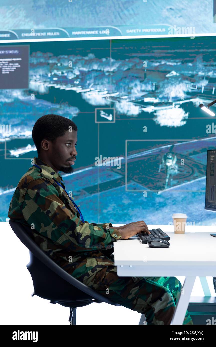 Military officer leads cybersecurity operations in a high tech ...