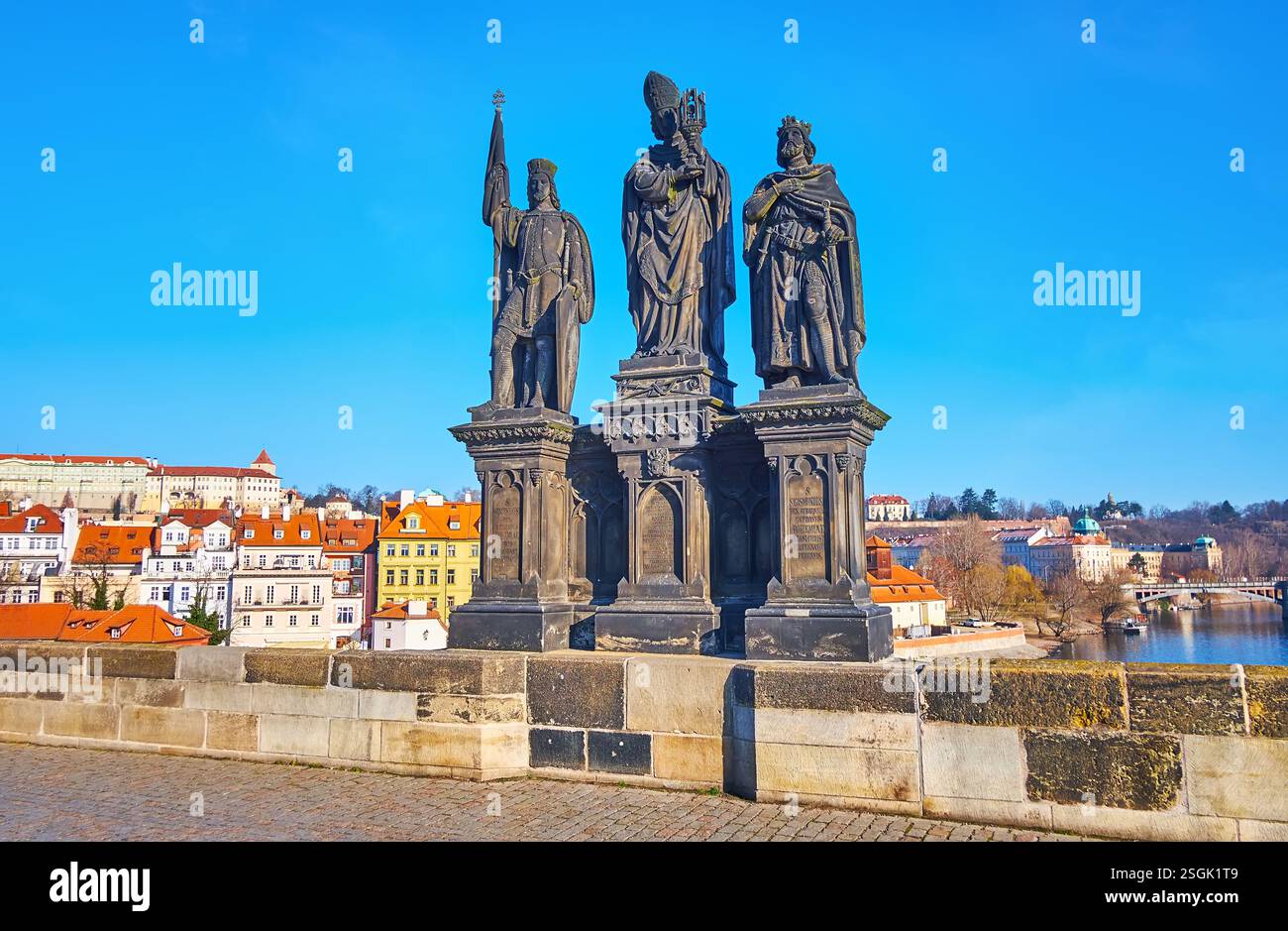 The stone Gothic statue of Saints Norbert, Wenceslaus and Sigismund on ...