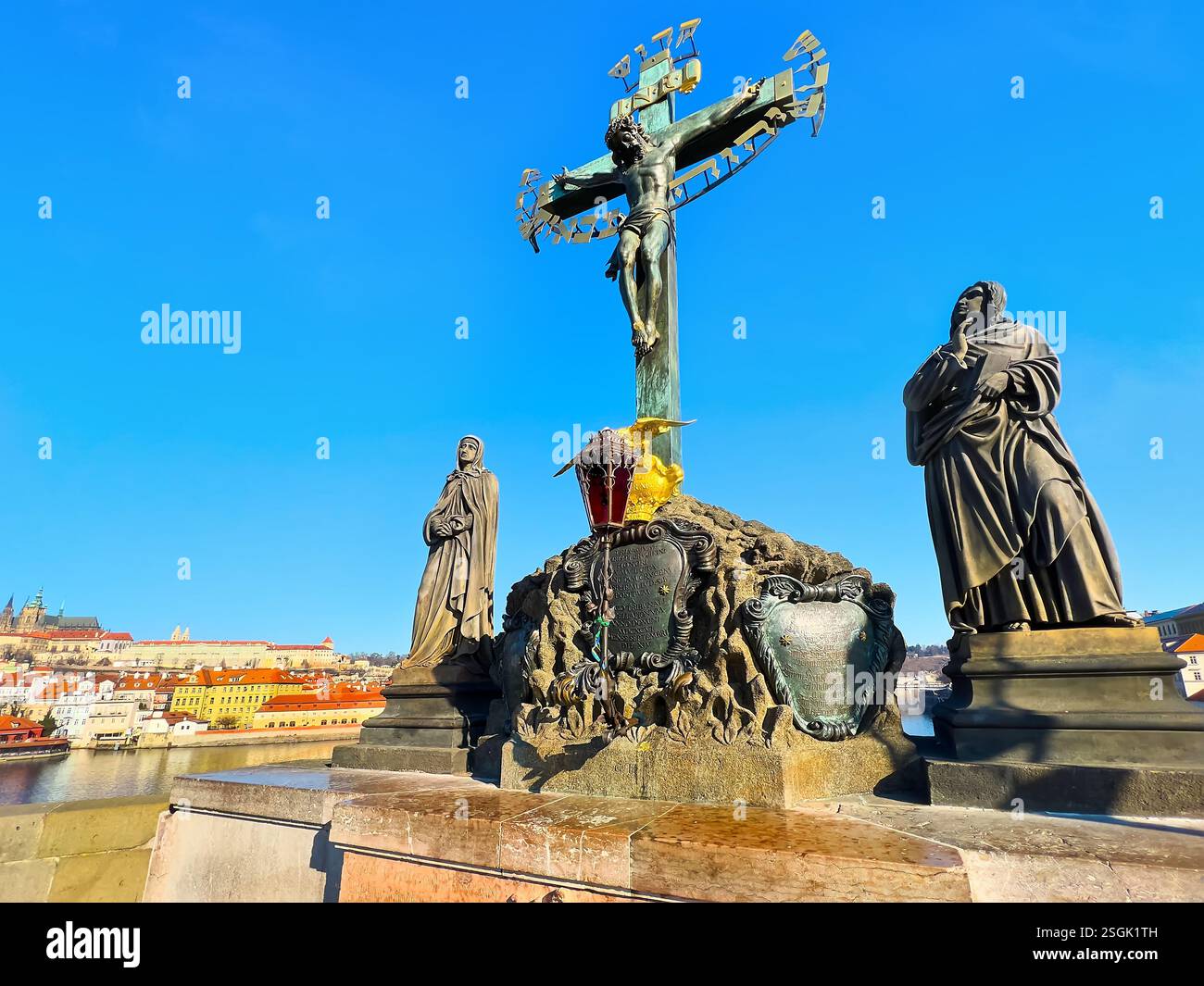 The ornate historic Holy Crucifix and Calvary Statuary with bronze ...
