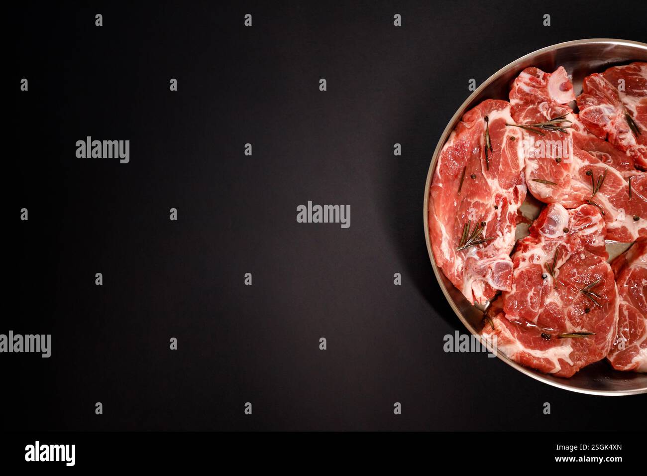 Freshly cut meat arranged in a casserole Stock Photo - Alamy