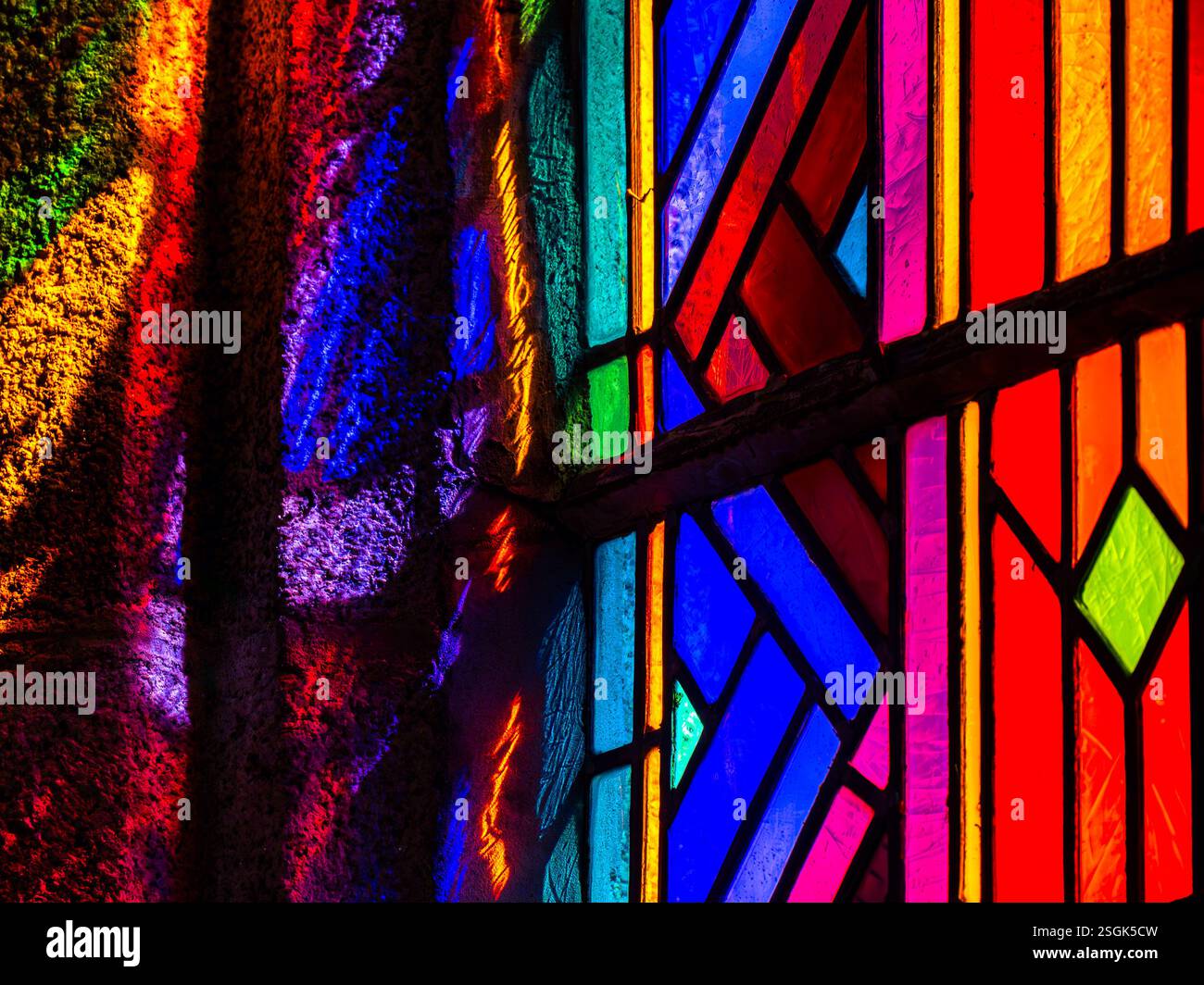 A close up abstract picture of a stained glass window in a medieval ...