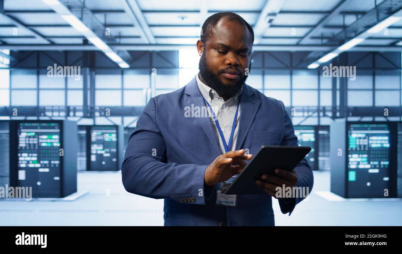 Software developer managing data center with advanced technology ...