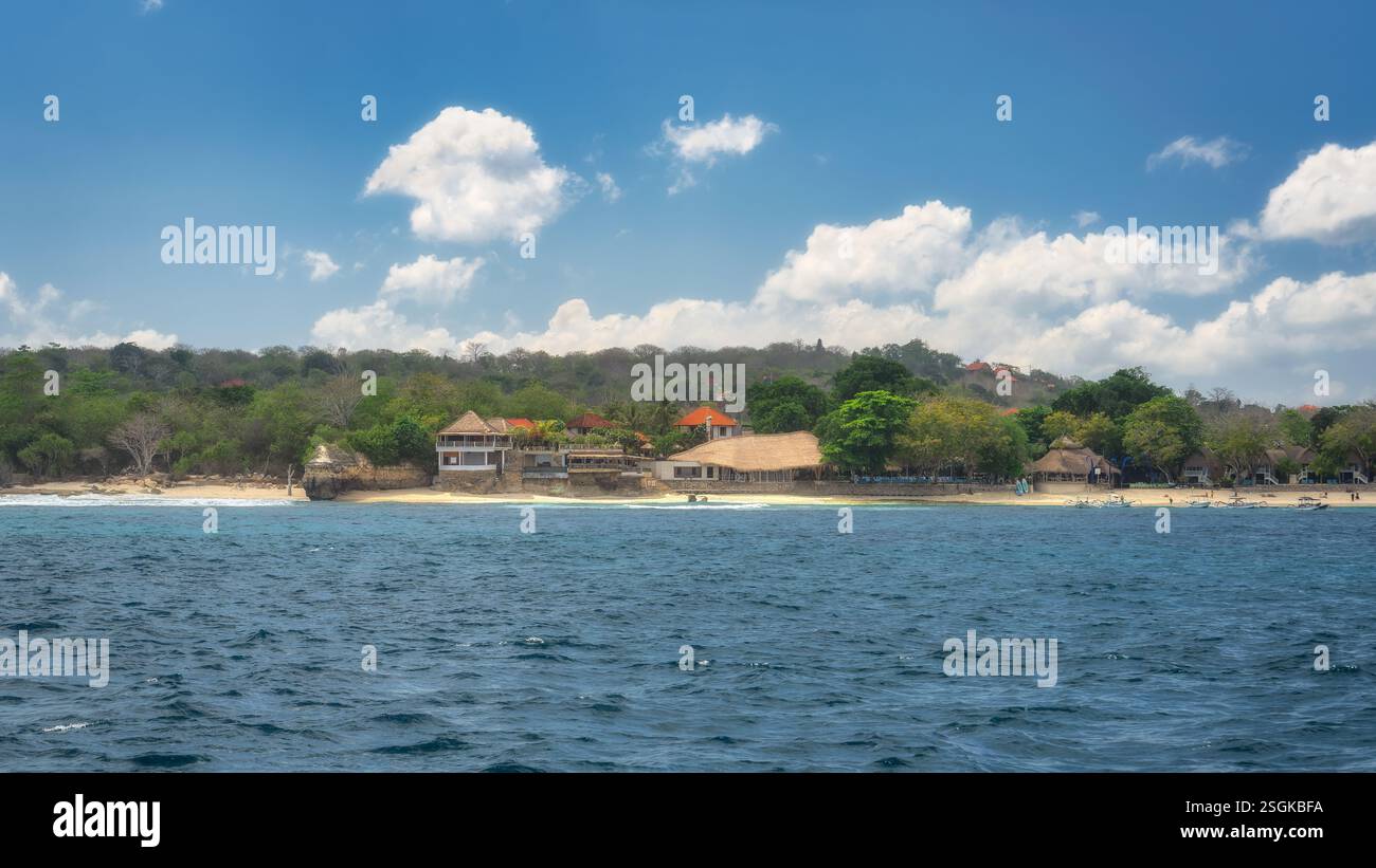 A serene and picturesque coastal landscape that showcases soft sandy ...