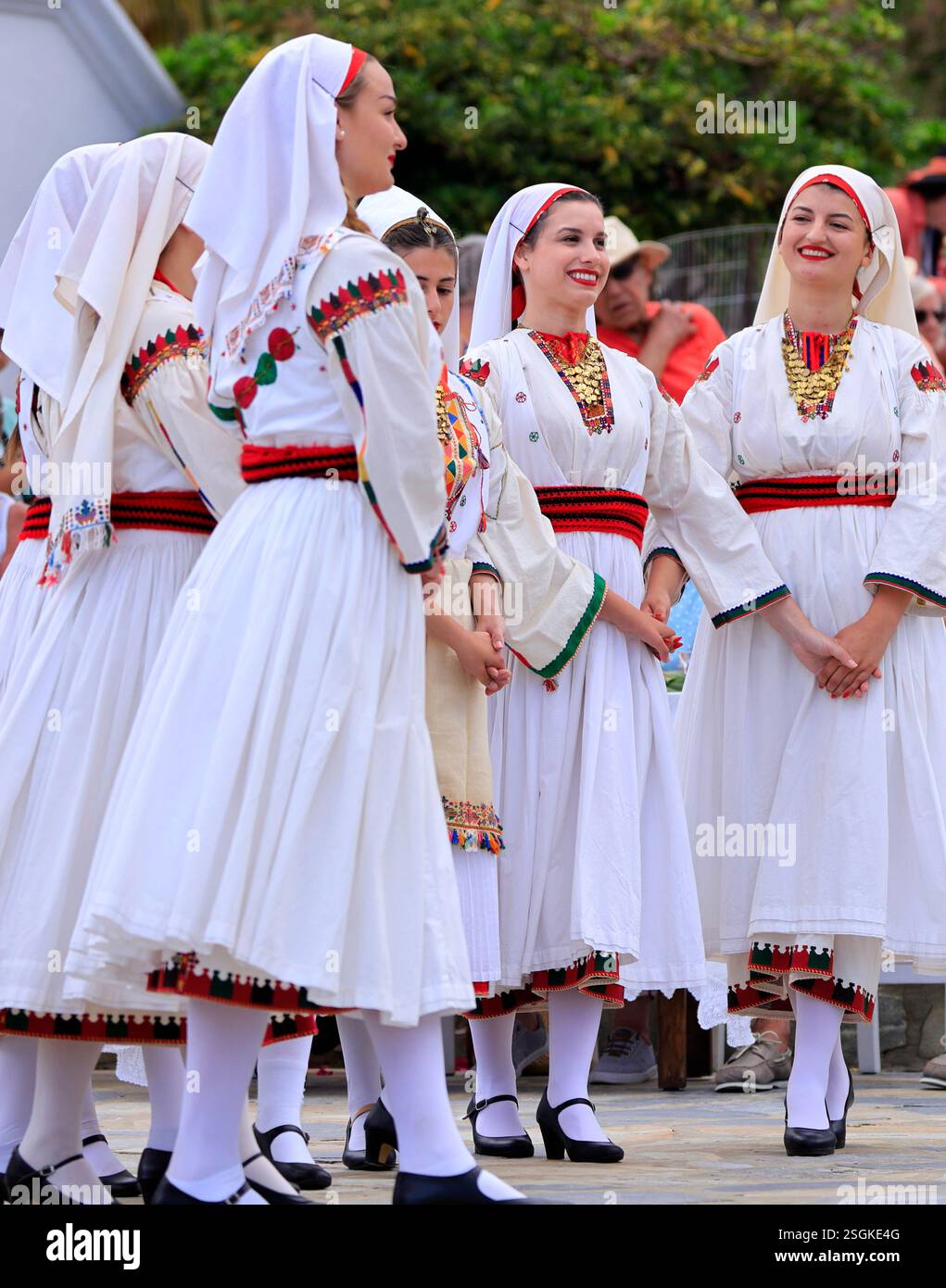 Traditional Greek dancers during the recording of a television ...