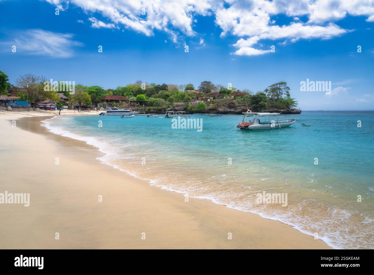 An incredibly tranquil beach scene unfolds, showcasing soft, warm sands ...