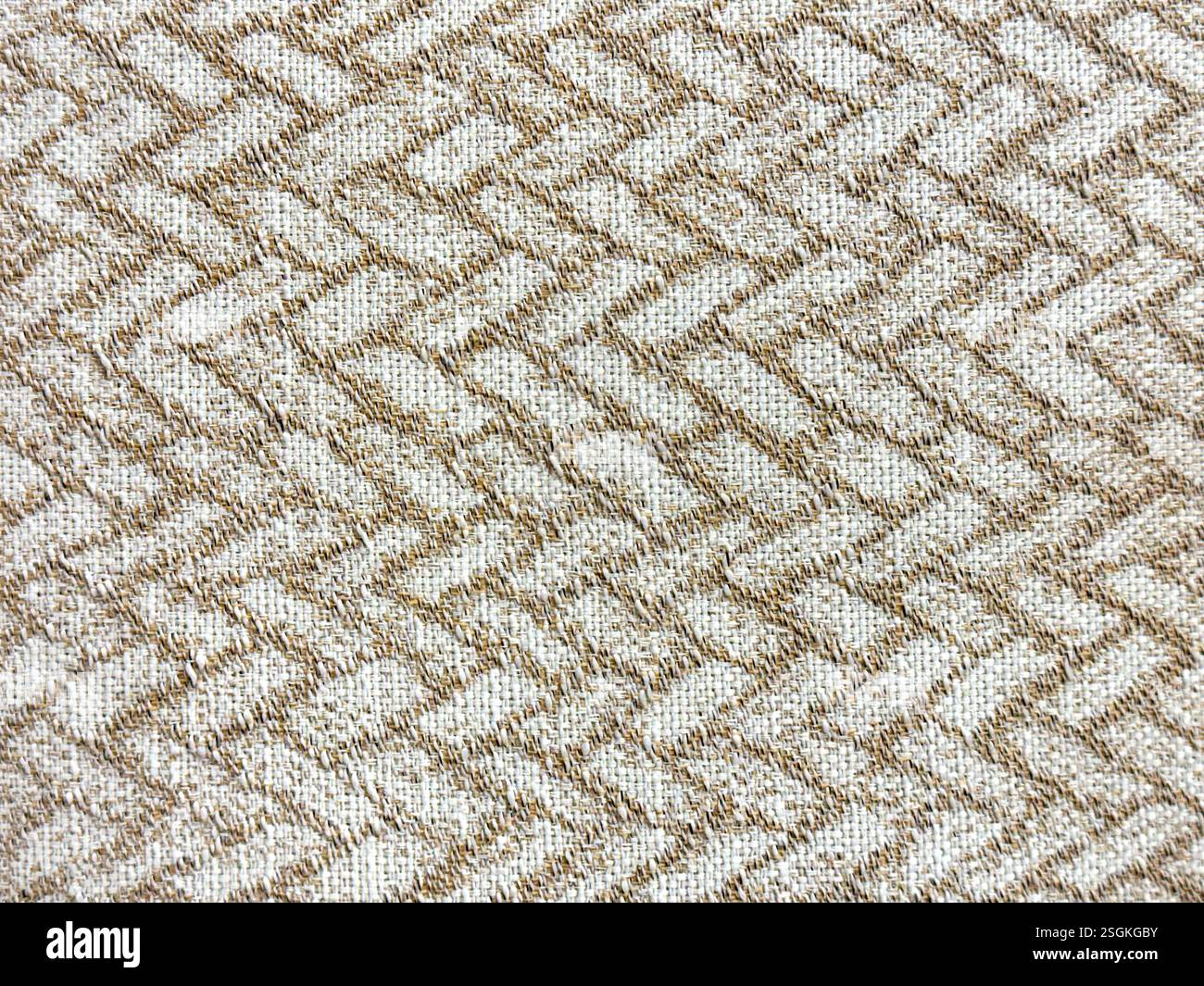 Close up of upholstery fabric in chevron pattern, in brown color ...