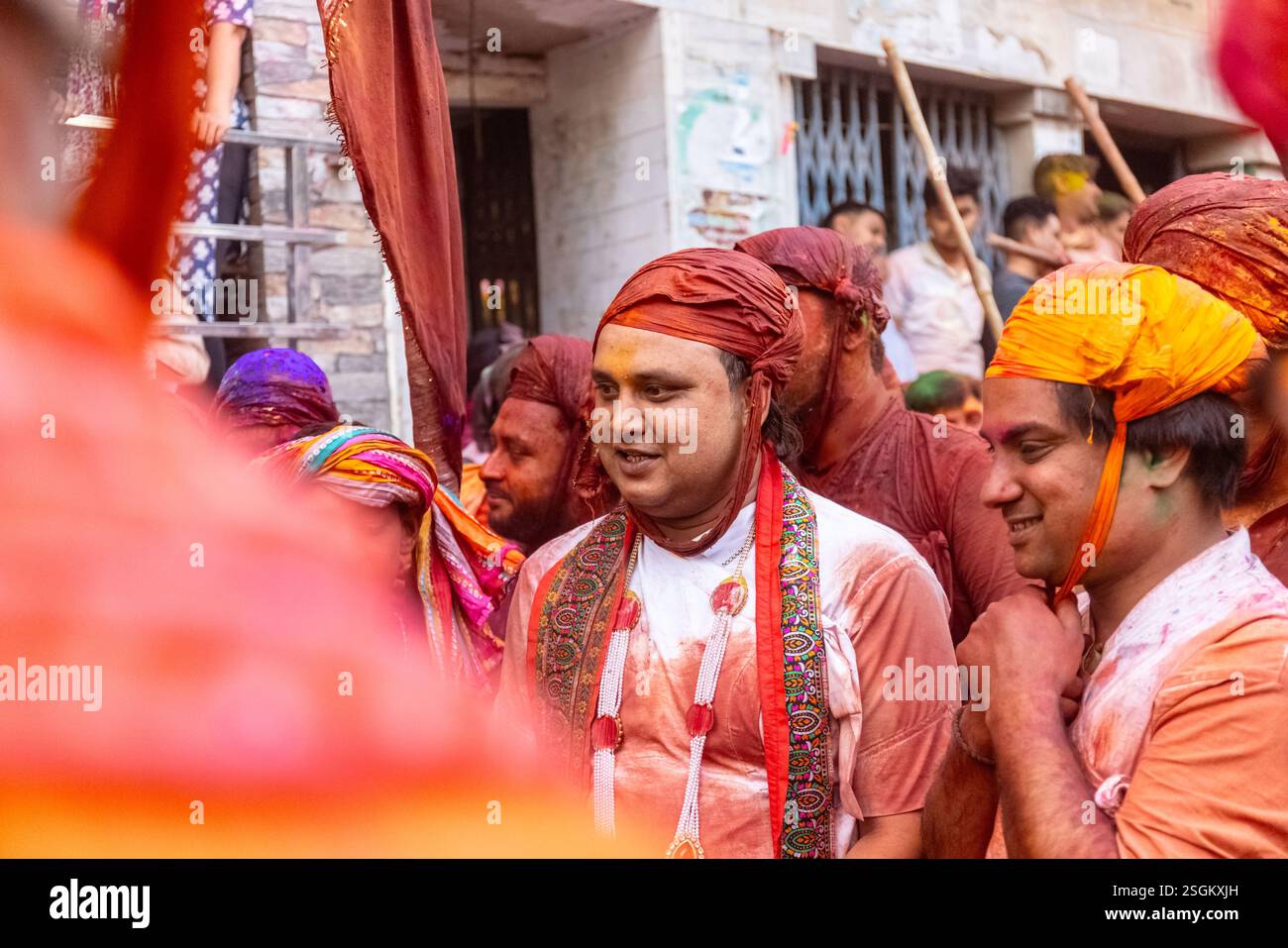 Group of hindu male from nandgaon in traditional clothes and colorful ...