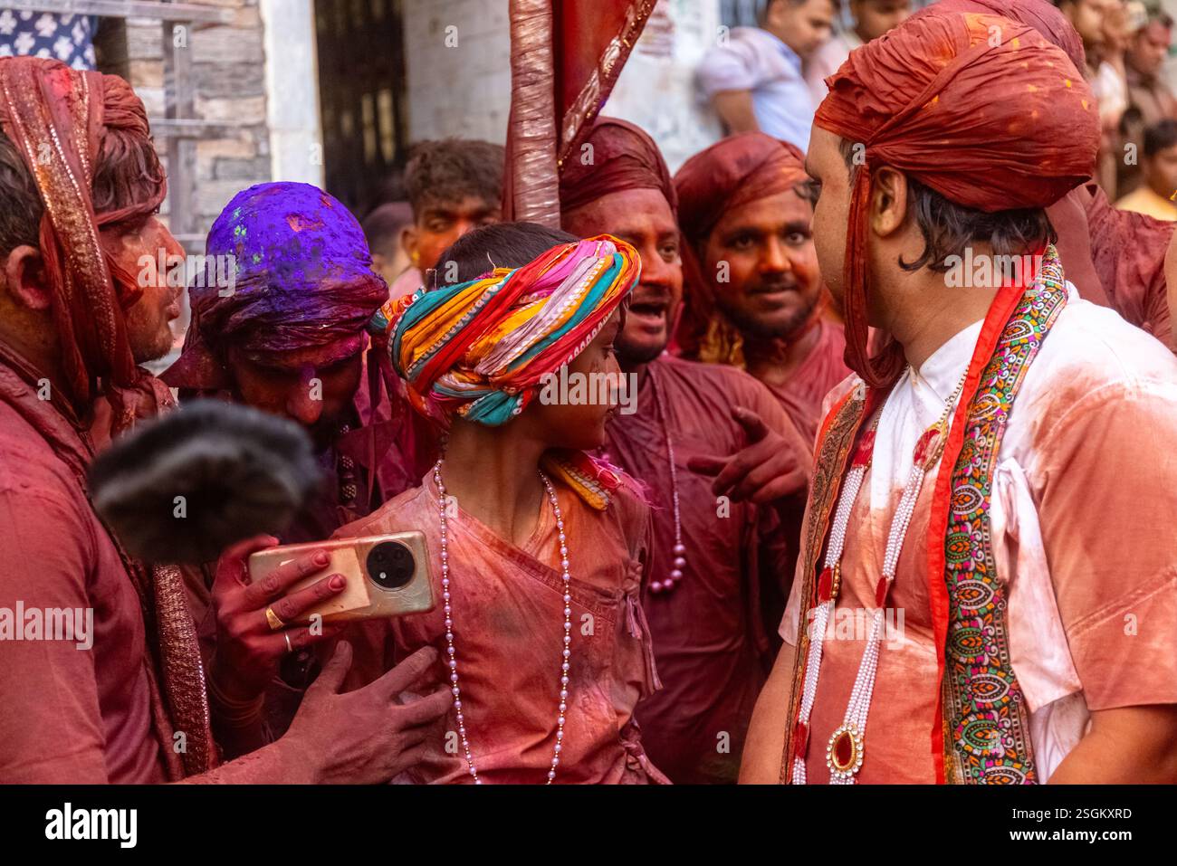Group of hindu male from nandgaon in traditional clothes and colorful ...