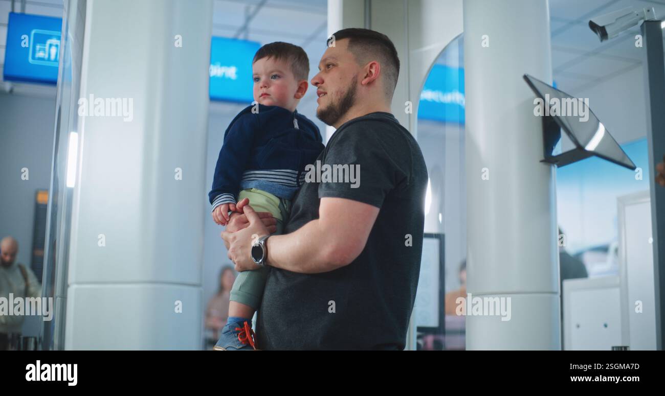 TSA Security Line in Airport: Family with Children Walking Through ...