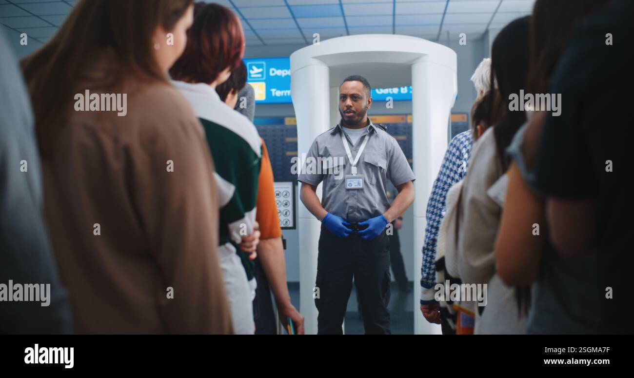Airport Security Checkpoint: African American Security Officer Gives ...