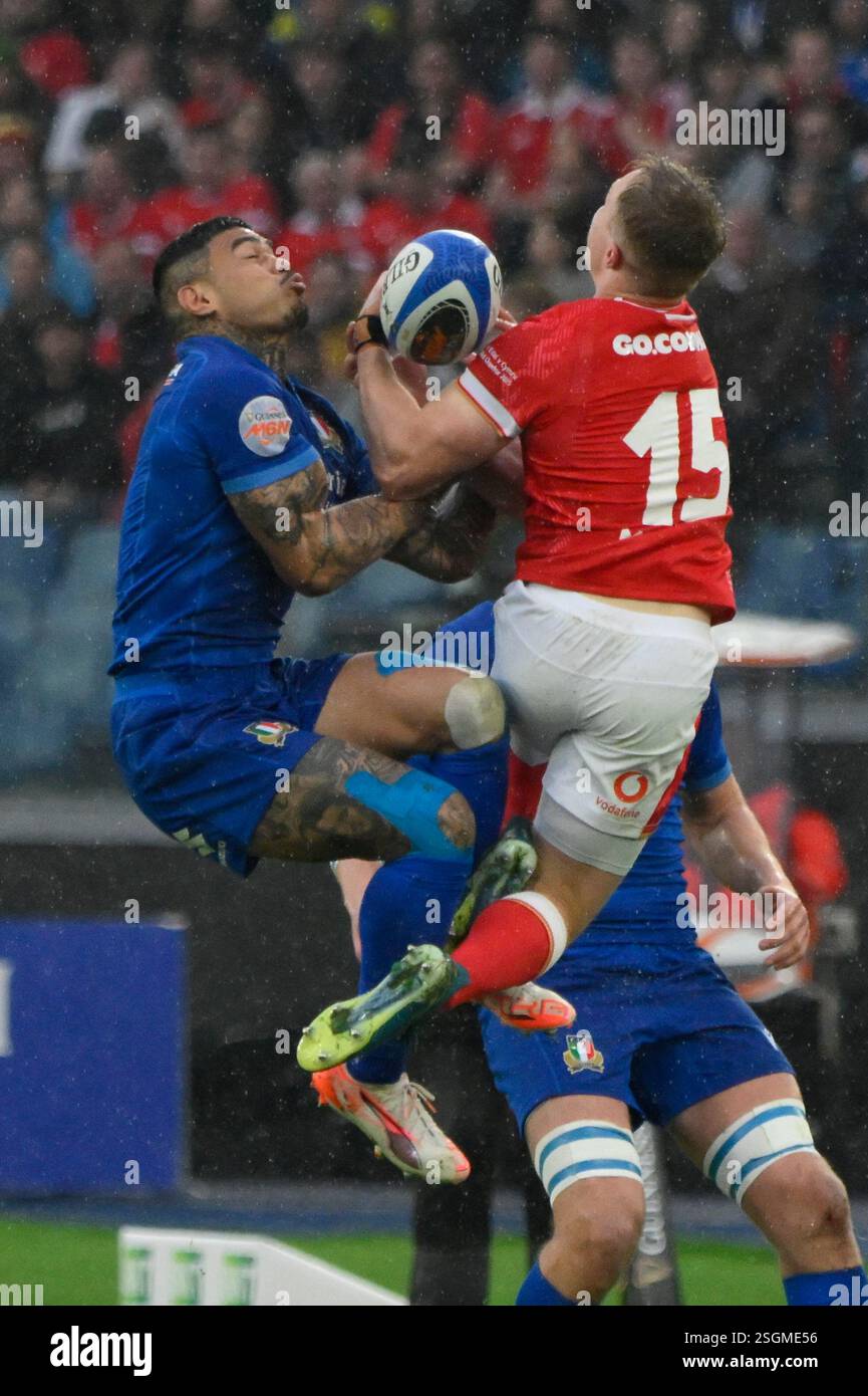 Roma, Italia. 08th Feb, 2025. Italia's Monty Ioane and Wales's Blair ...