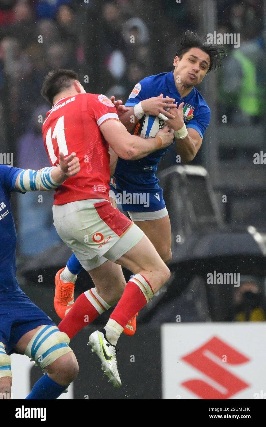 Roma, Italia. 08th Feb, 2025. Italia's Monty Ioane and Wales's Josh ...