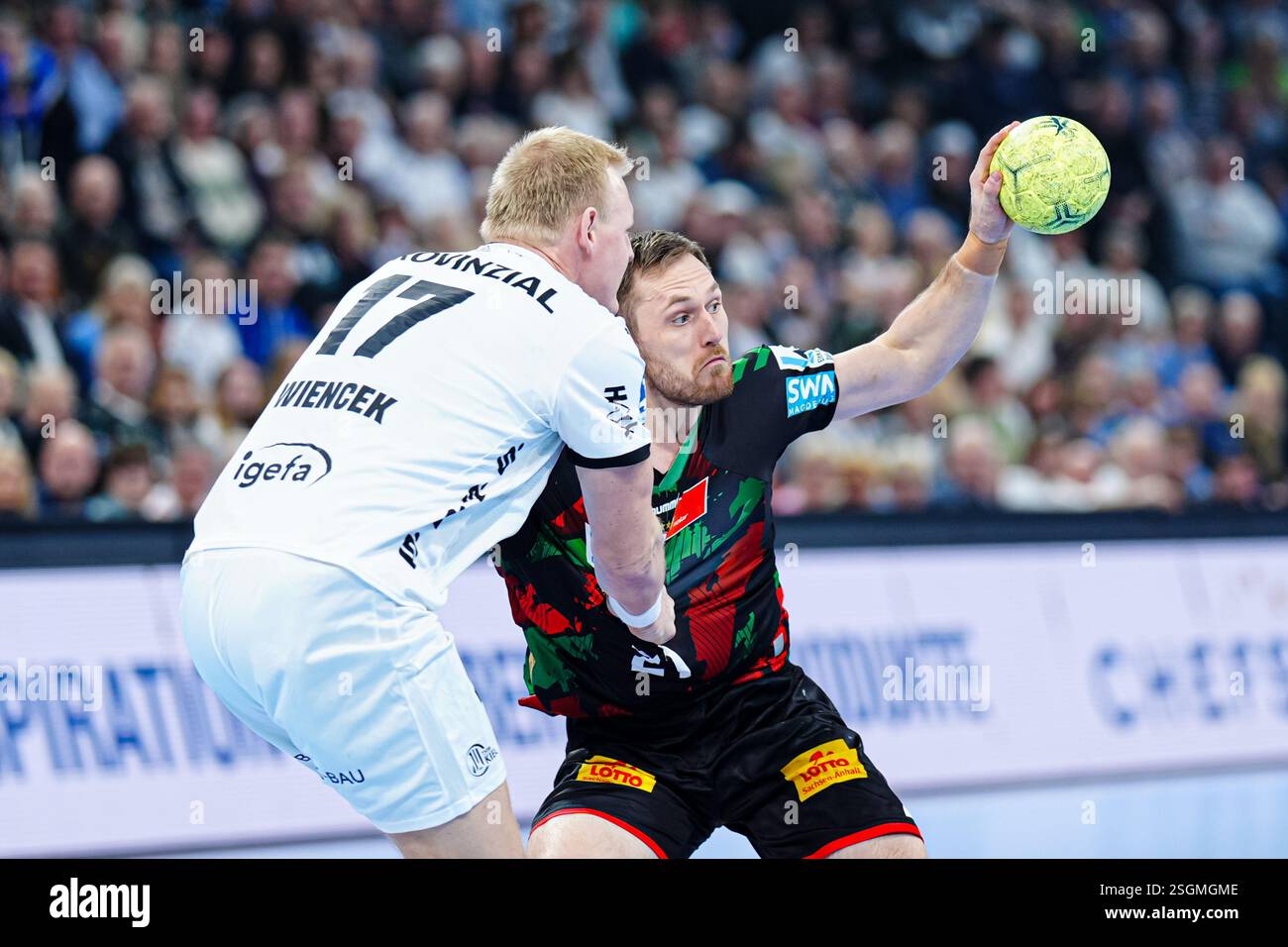 Patrick Wiencek (THW Kiel, #17), Albin Lagergren (SC Magdeburg, #21 ...