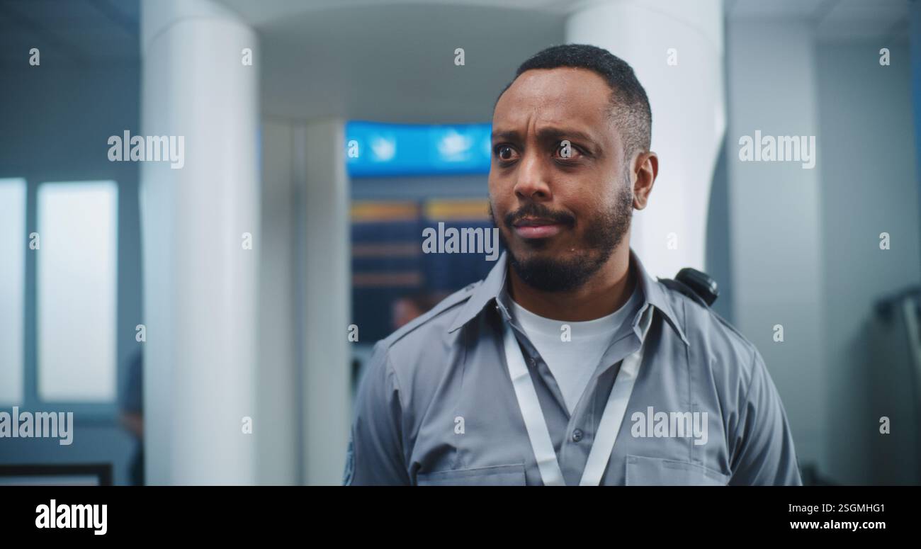 Airport Security Checkpoint: Positive African American Security Officer ...
