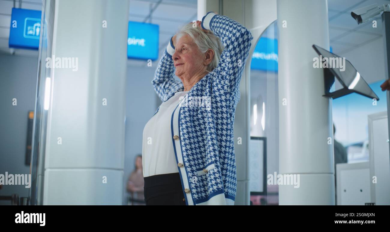 TSA Security Checkpoint in Airport: Elderly Woman Passing Through Metal ...