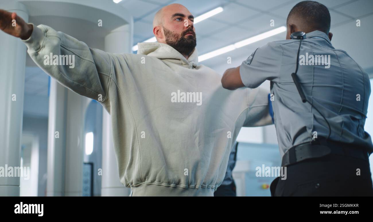 Tsa worker checks travelers hi-res stock photography and images - Alamy