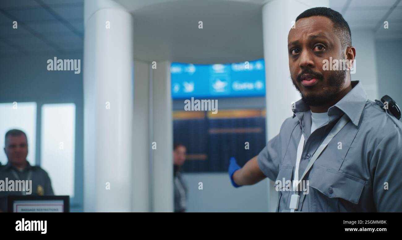 Airport Security Checkpoint: Positive African American Security Officer ...