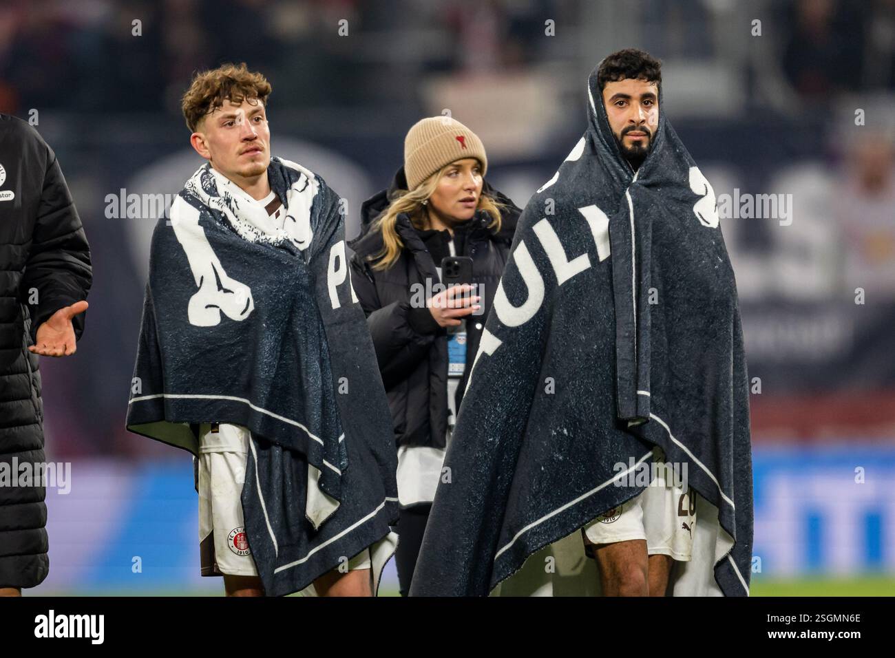 Leipzig, Germany. 09th Feb, 2025. Philipp Treu (L) and Elias Saad (R ...