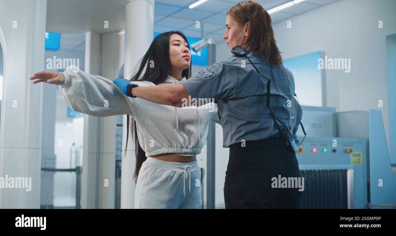 Security Checkpoint in Airport Terminal: Female Security Officer Checks ...