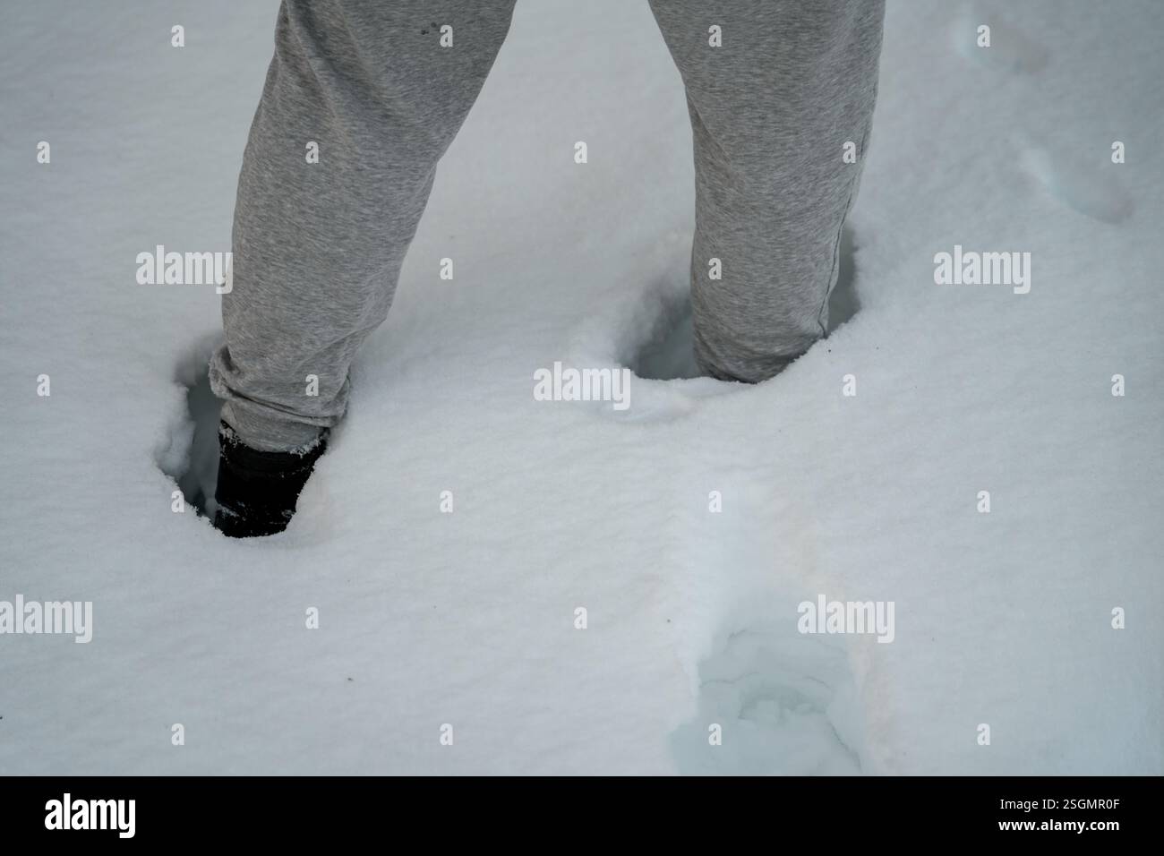 Feet sinking in deep snow in Oslo, winter scene Stock Photo - Alamy