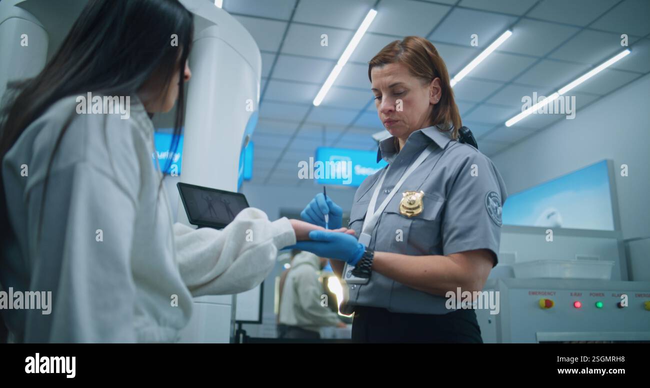 Airport Security Checkpoint: Female Security Officer Doing TSA Hand ...