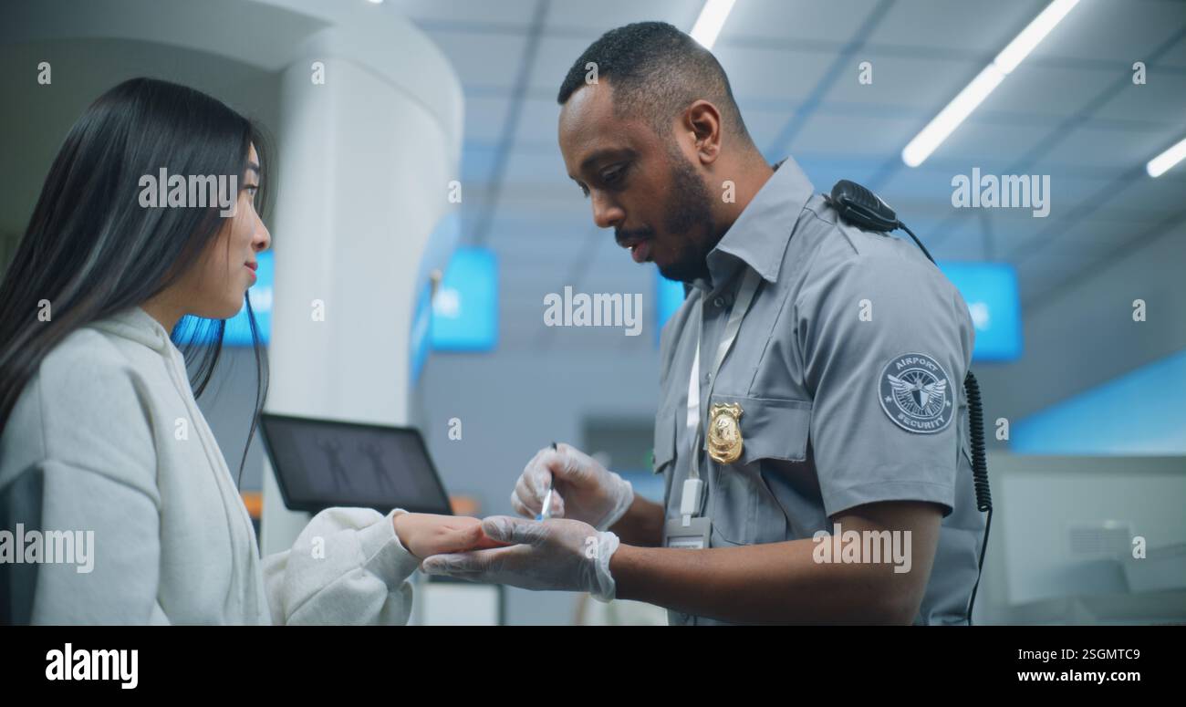 Airport Terminal: African American Security Officer Conducts TSA Hand ...