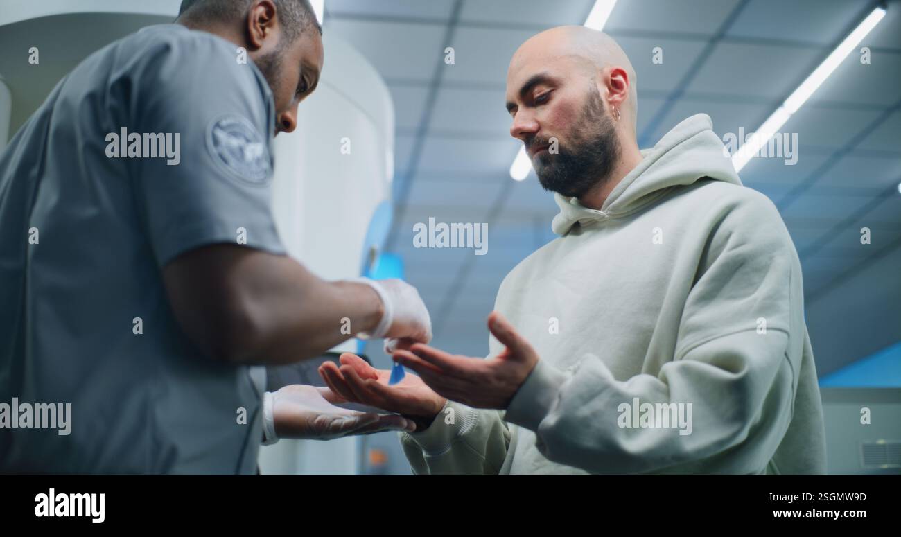 Airport Security Checkpoint: African American Security Officer Doing ...