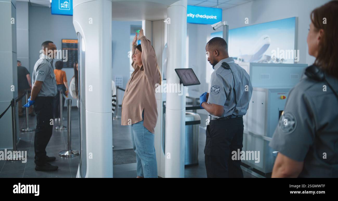 TSA Security Line in Airport: Diverse People Walking Through Metal ...