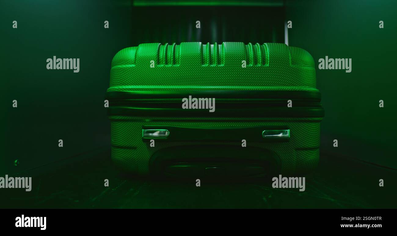 Security Checkpoint in Airport Terminal: Close Up of Suitcase Moving on ...