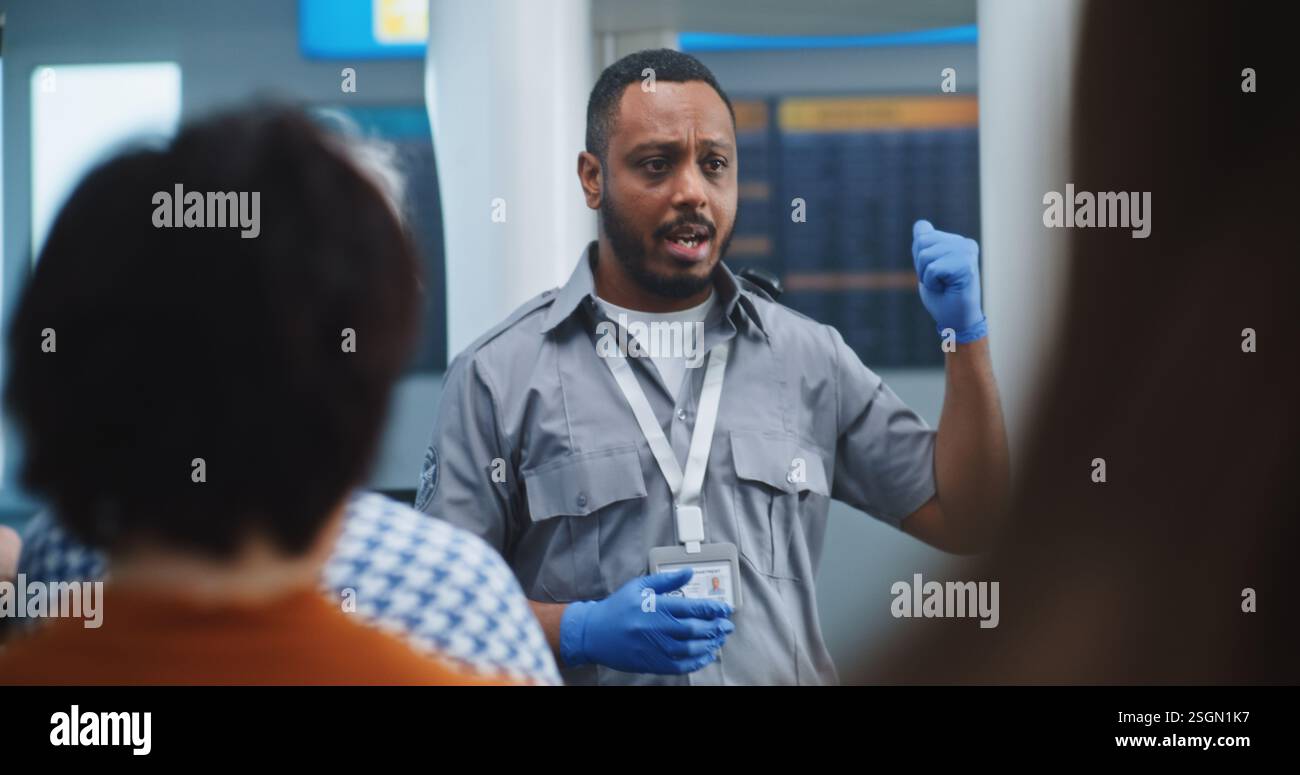 Security Checkpoint in Airport Terminal: African American Security ...