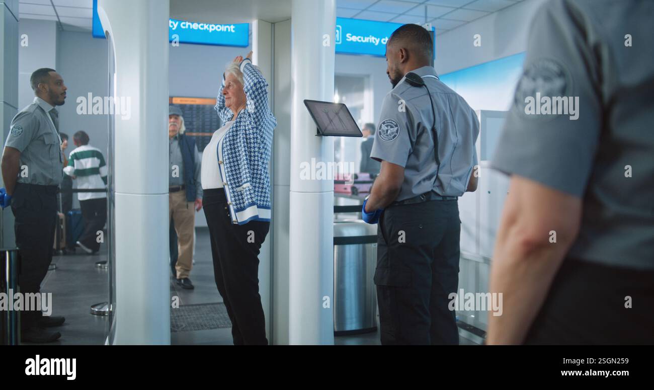 Airport Terminal: Elderly Woman Passing Through Metal Detector Scanner ...