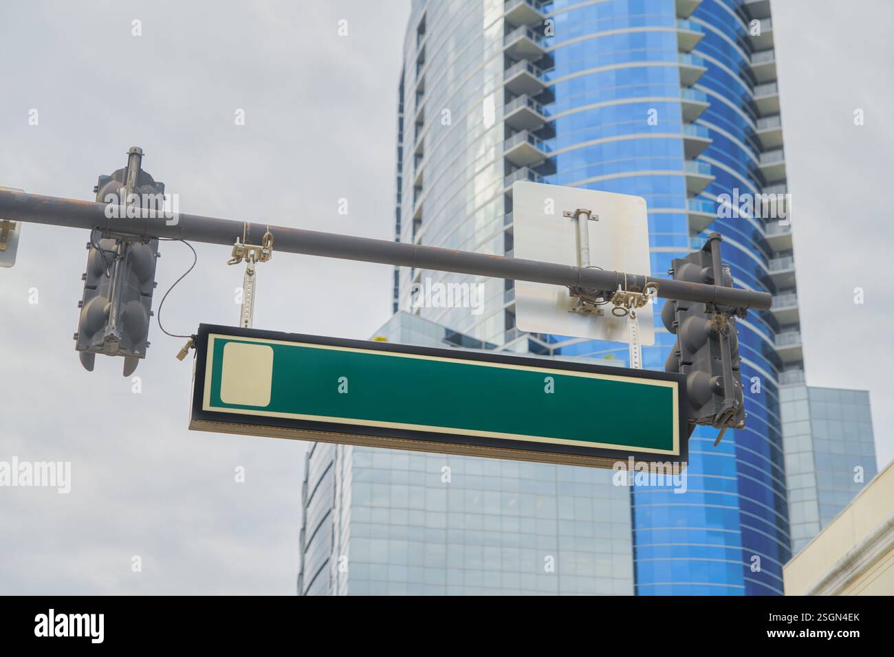 Blank road sign and traffic light on a city street Stock Photo - Alamy