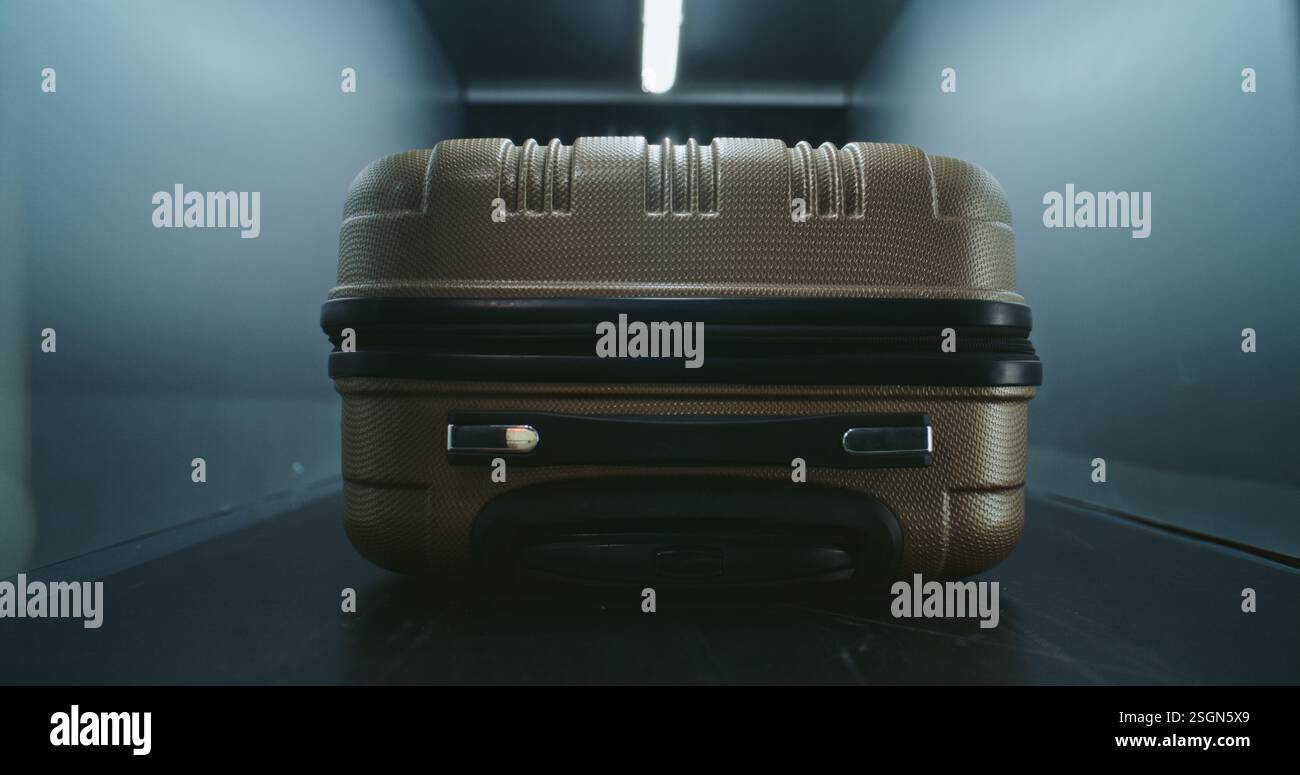 Security Checkpoint in Airport Terminal: Close Up of Suitcase of ...