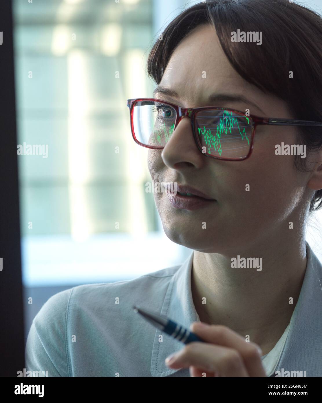 Business women viewing a graph showing company performance Stock Photo ...