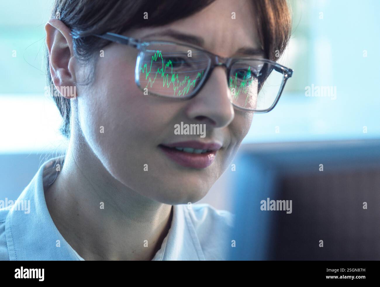 Business women viewing a graph showing company performance Stock Photo ...