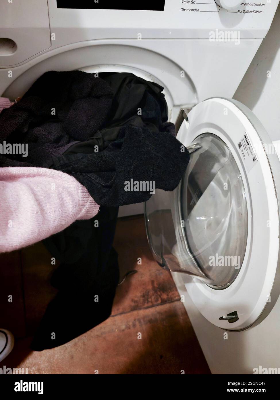 washing machine for doing the laundry, washing textiles and clothes ...
