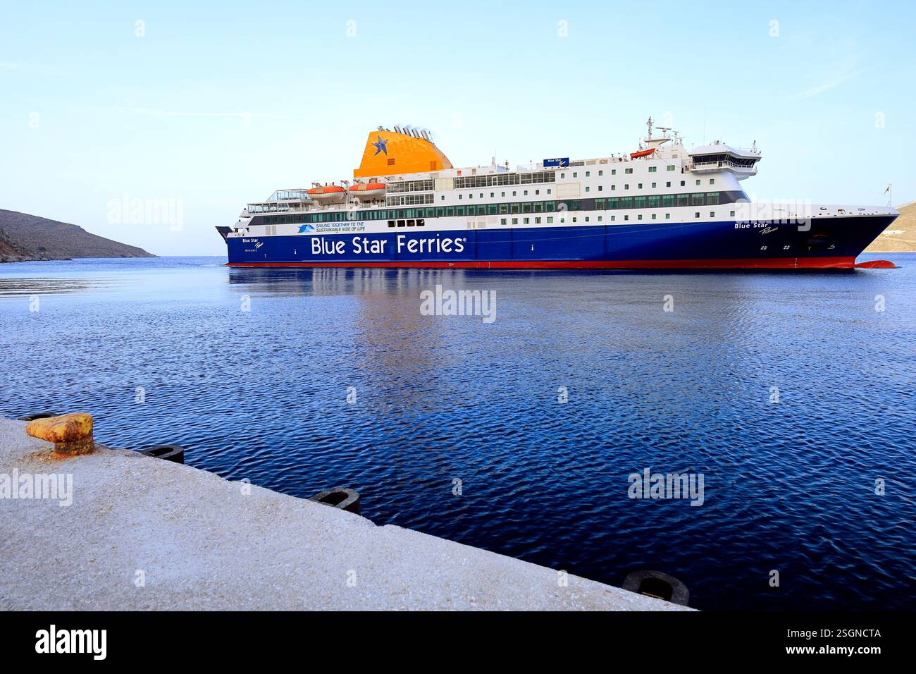 Blue Star Ferries ship The Patmos arriving at Livadia harbour, Tilos ...