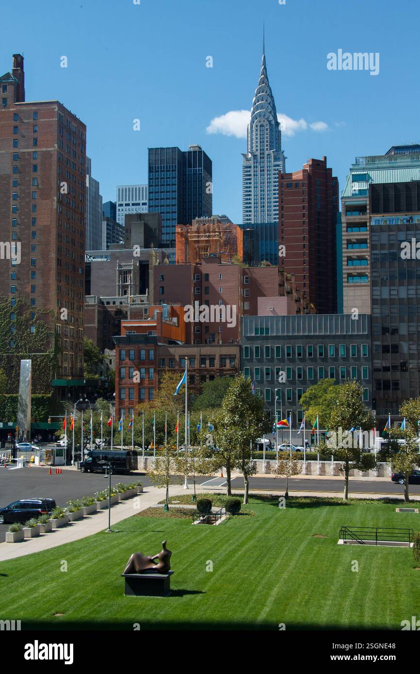 The Chrysler iconic skyscraper building and the skyscape of Midtown ...