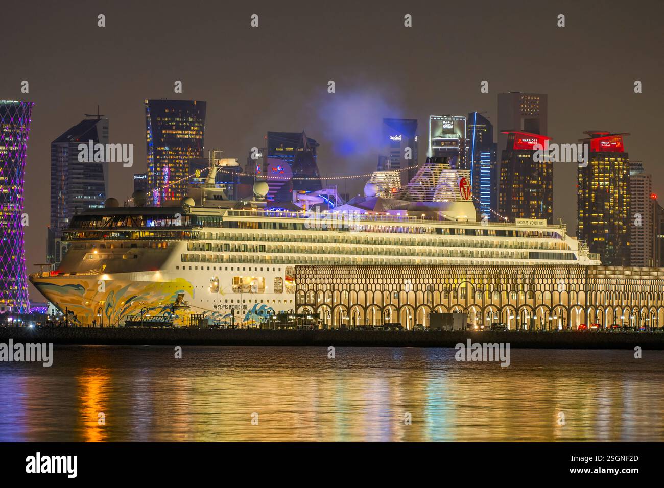 Doha Skyline night view from Mina Port Doha Qatar Stock Photo - Alamy