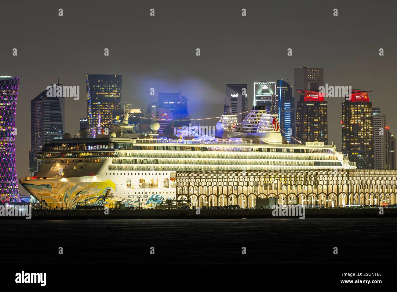 Doha Skyline night view from Mina Port Doha Qatar Stock Photo - Alamy