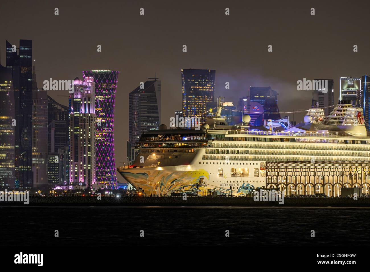 Doha Skyline night view from Mina Port Doha Qatar Stock Photo - Alamy