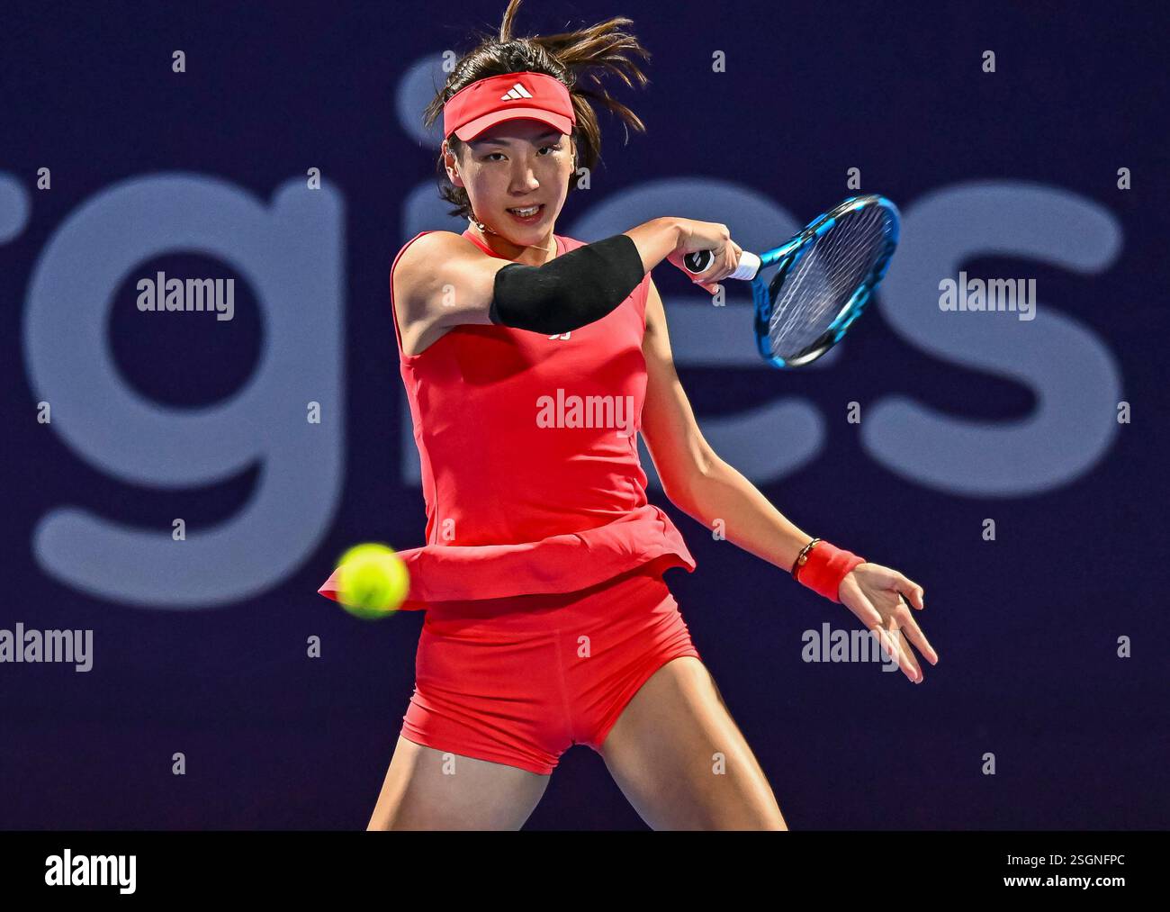 Doha, Qatar. 9th Feb, 2025. Wang Xinyu of China hits a return during ...