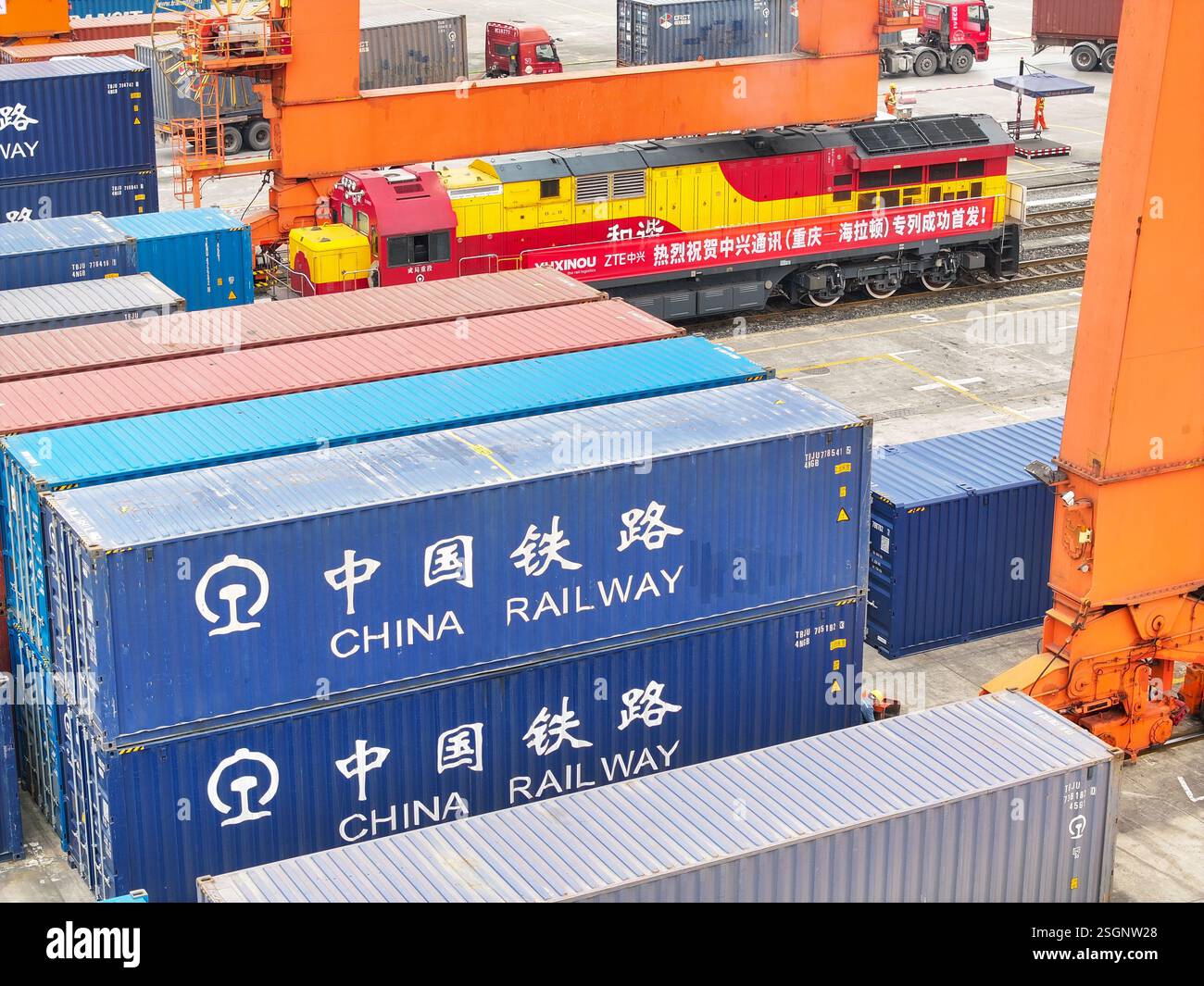 Chongqing, China. 10th Feb, 2025. A drone photo shows a cargo train ...