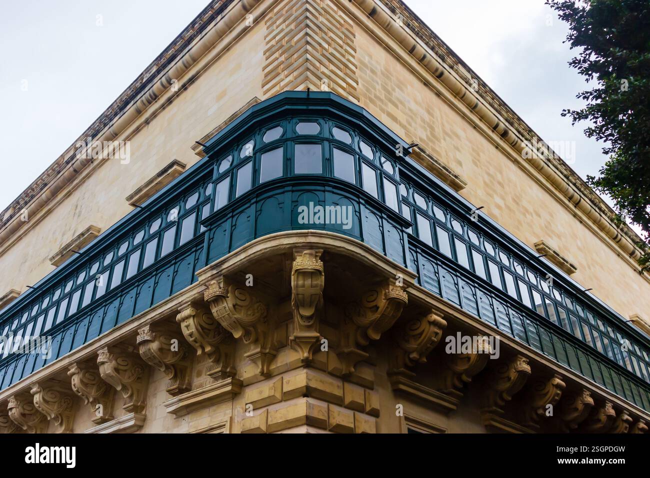 Historic Corner Building with Ornate Windows and Architectural Details ...