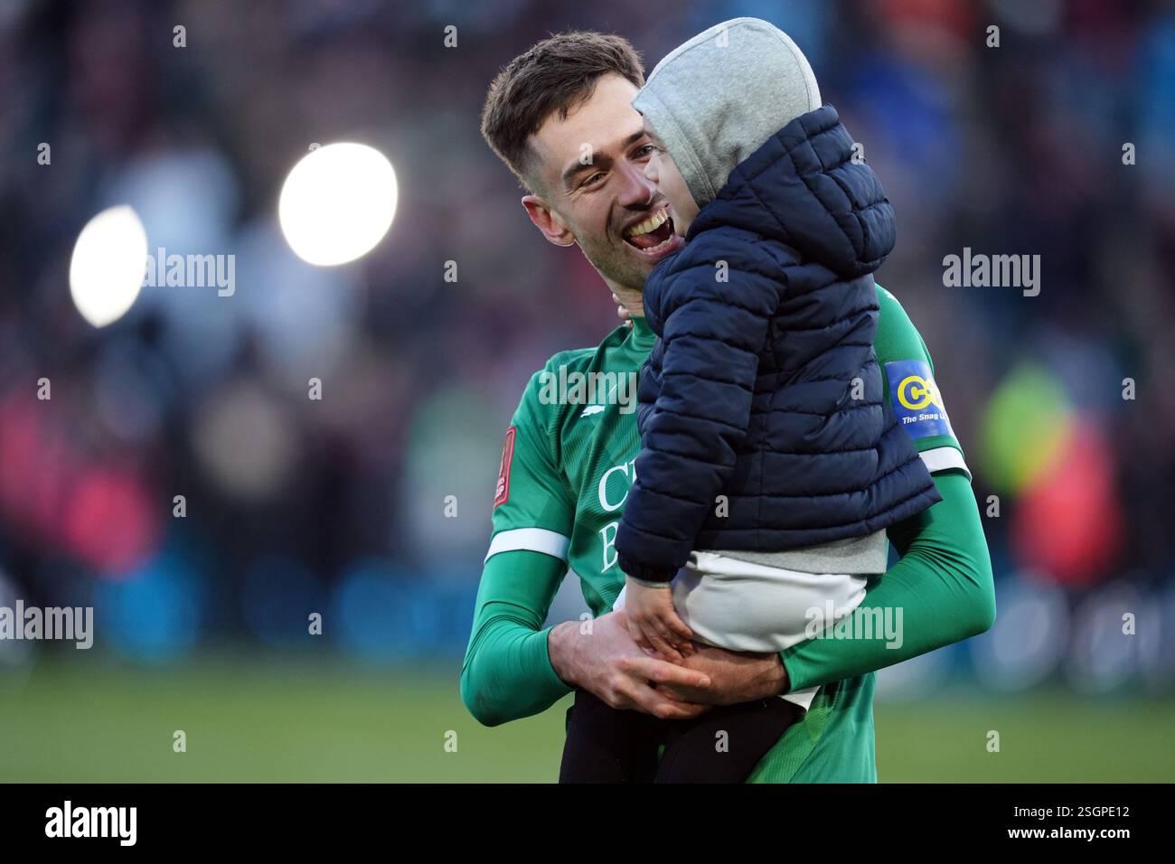 Ryan Hardie celebrating with his son following the Emirates FA Cup ...