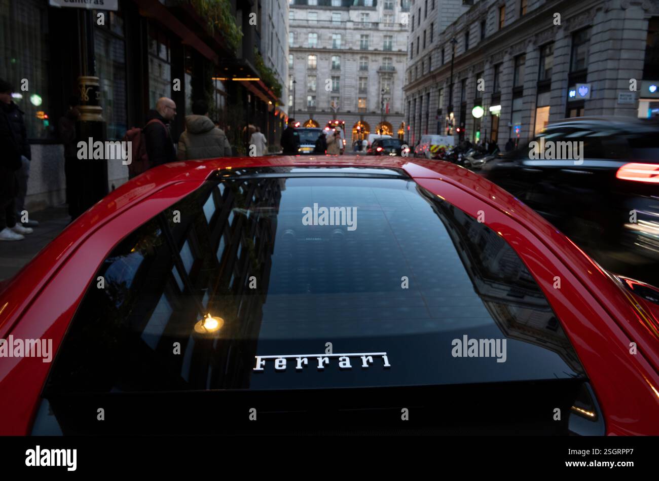 Red Ferrari sportswear parked on Berkeley Street, in central Mayfair ...
