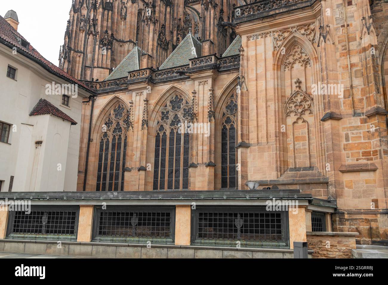Ancient gothic stone wall with arches and columns in Prague, Czech ...