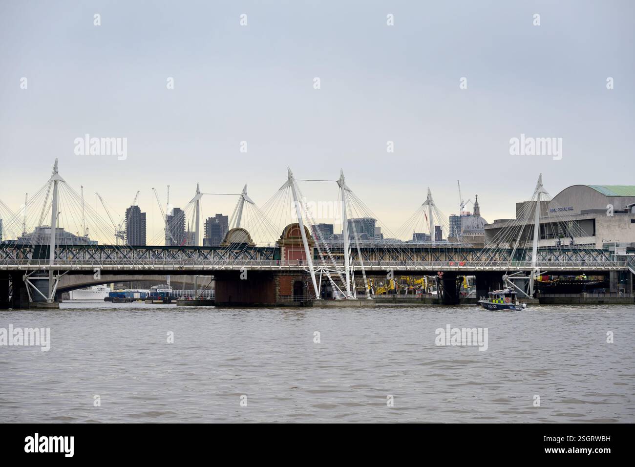 London, UK. Hungerford Rail Bridge and Golden Jubilee Bridges ...